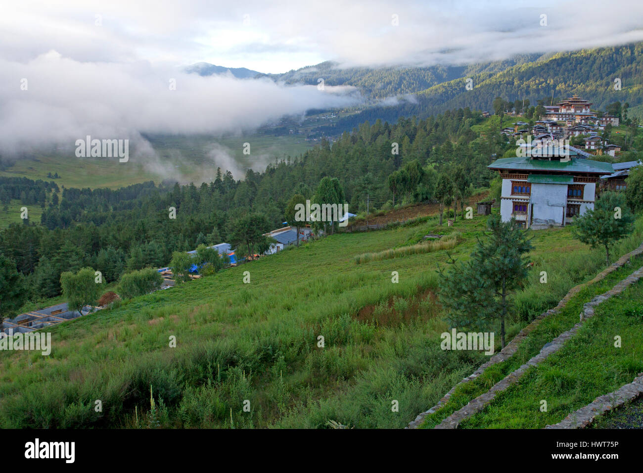 Mist over the Phobjikha Valley from the village of Gangtey Stock Photo ...
