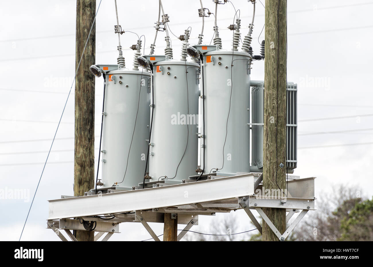 Three Electric Utility Transformers On Telephone Poles Stock Photo - Alamy