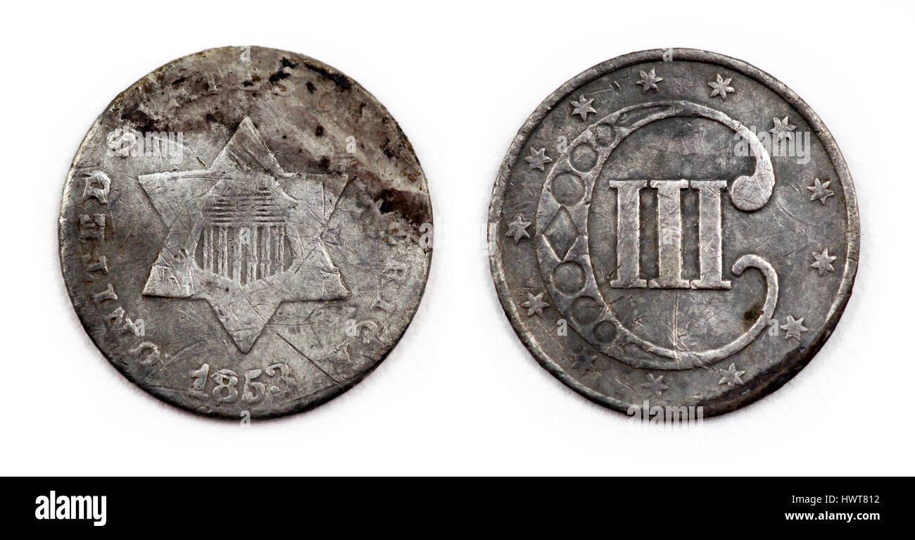 An 1853 United States three cent (3 cent) coin reverse and obverse up ...