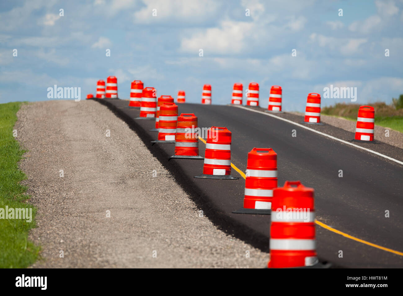 Construction zone on a newly paved road Stock Photo - Alamy