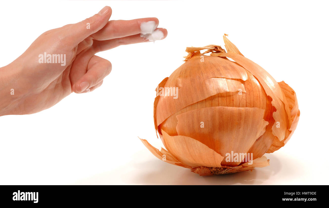 Dry skin on onion representing skincare problems Stock Photo - Alamy
