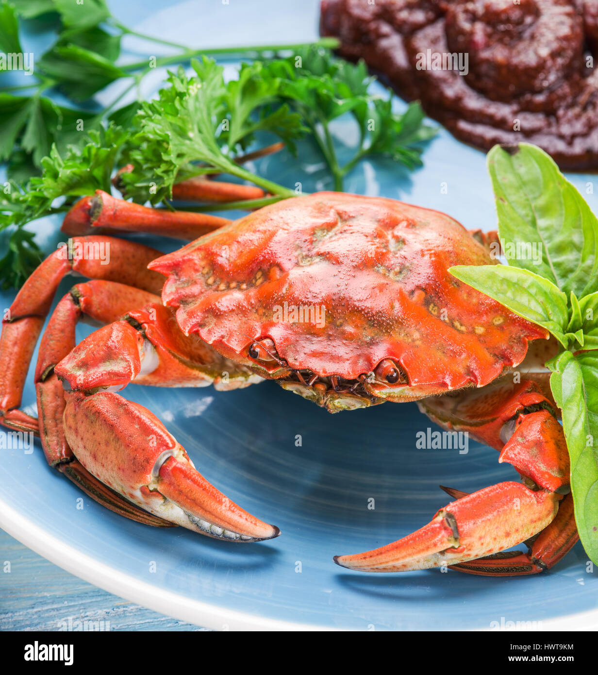 Seafood dish - cooked crab with lemon and herbs Stock Photo - Alamy