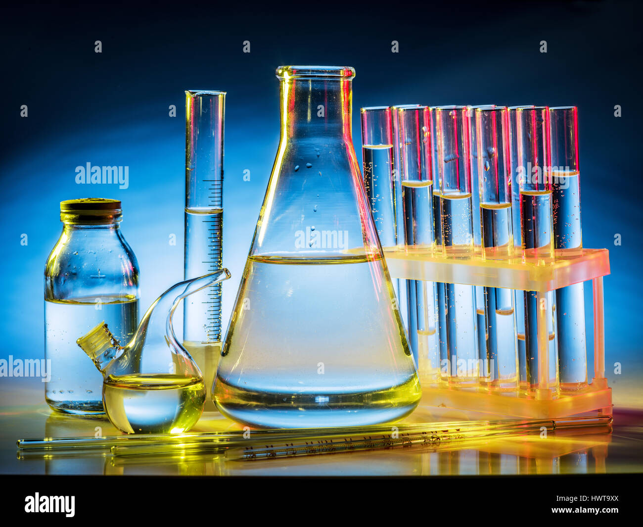 Different laboratory beakers and glassware. Multicolored Stock Photo ...
