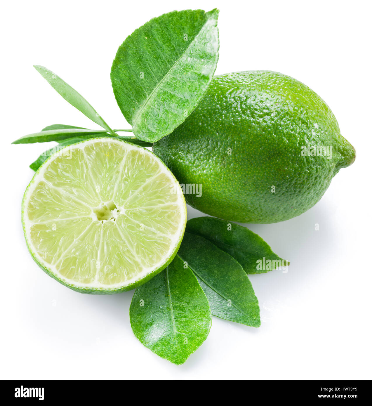 Ripe lime fruit with a half of lime on the white background Stock Photo ...