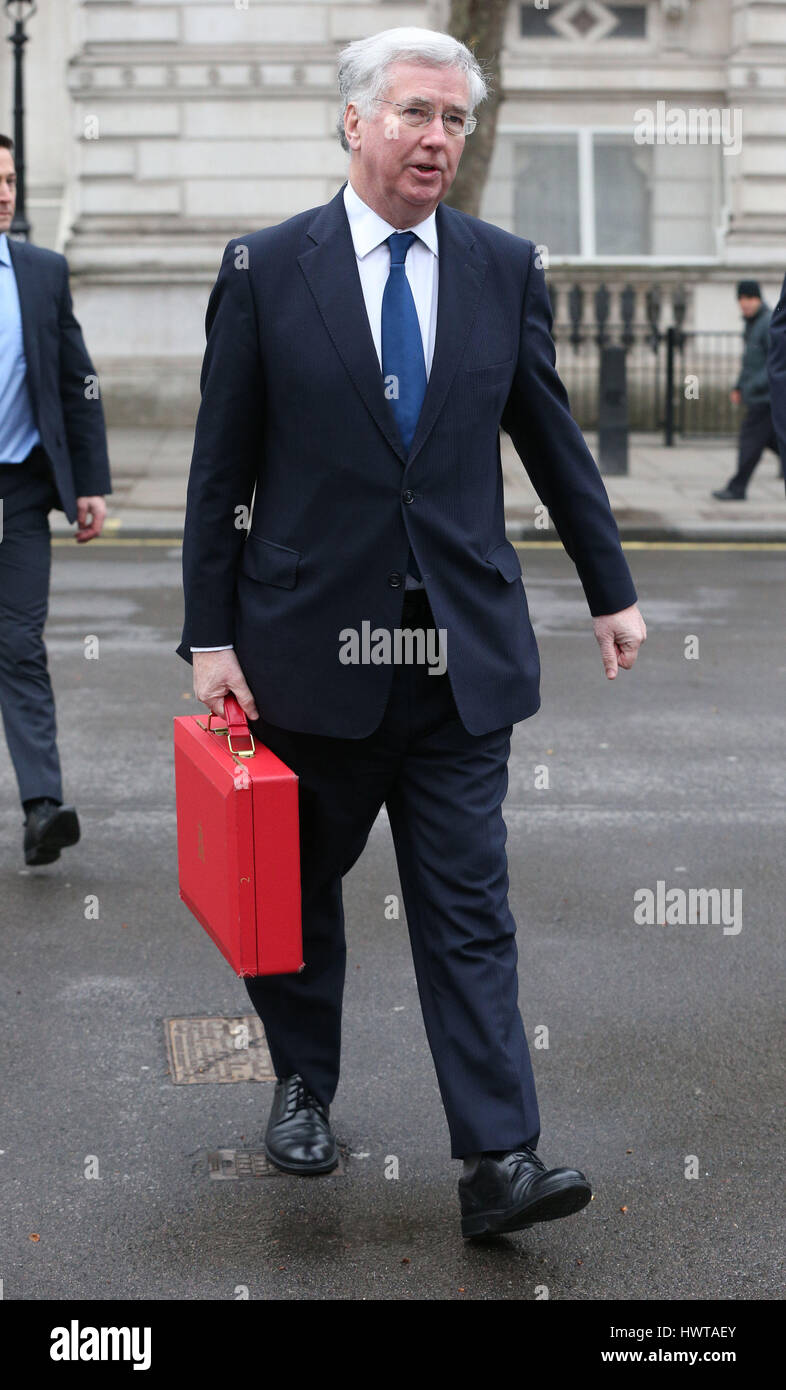 Defence Secretary Sir Michael Fallon leaves Dowiing Street in London ...