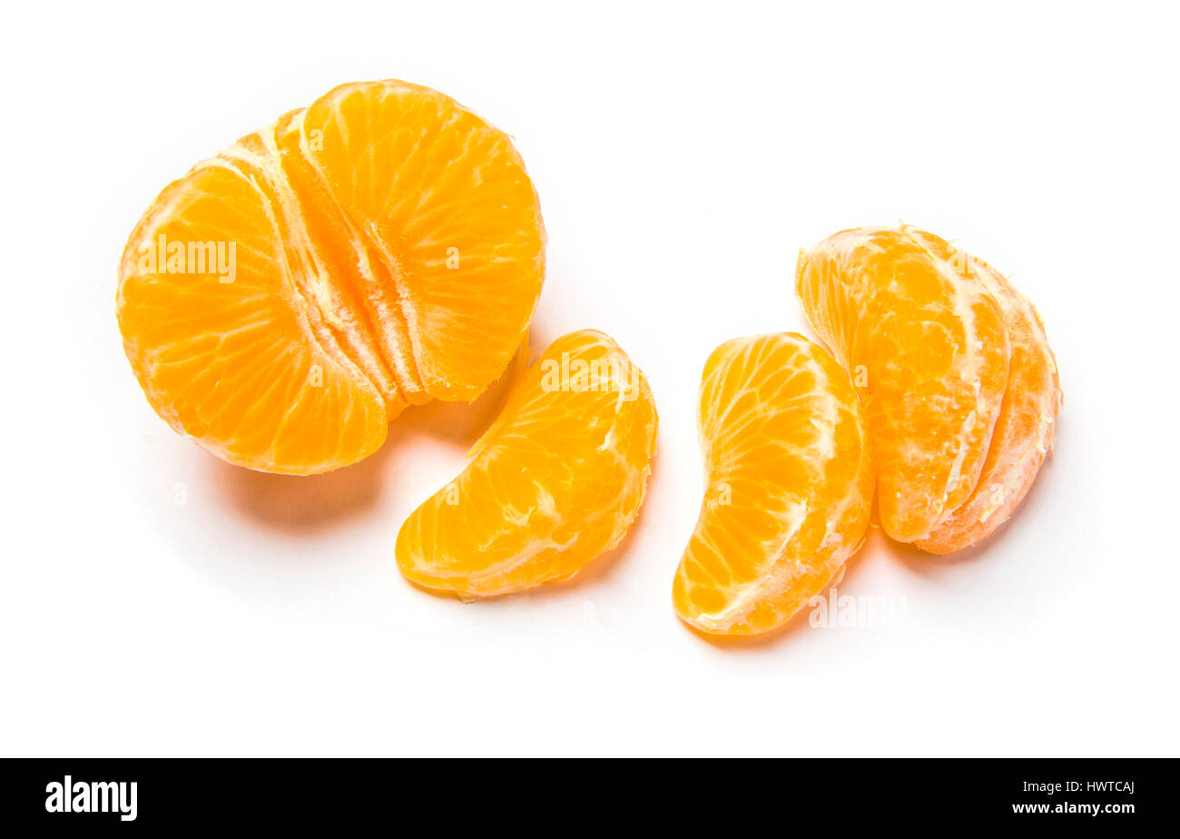 piece of fruit of tangerine with leaves and guys Stock Photo - Alamy