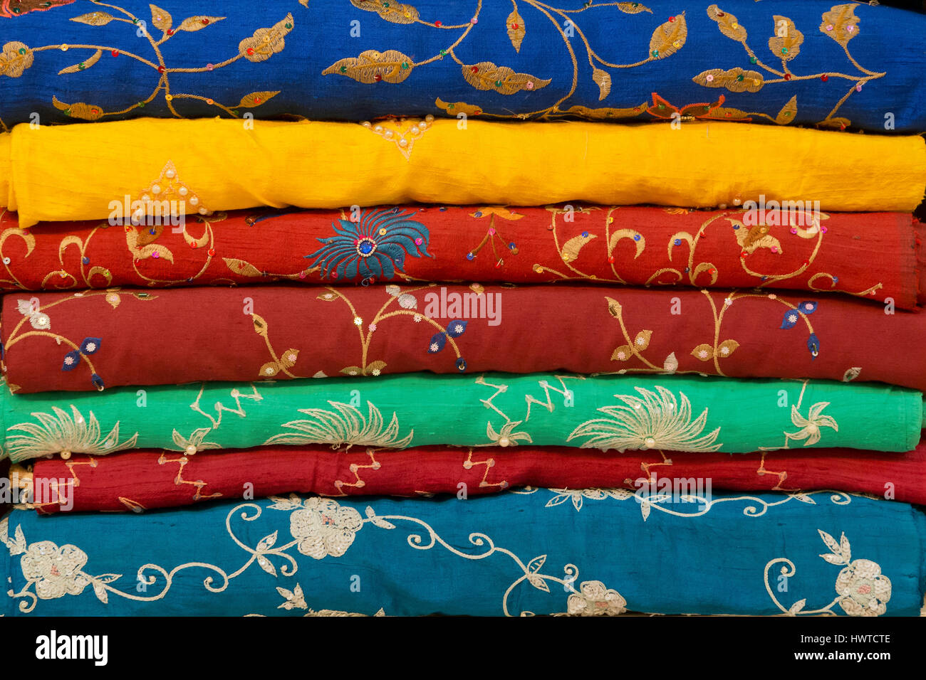 Different color textiles in indian silk Stock Photo - Alamy