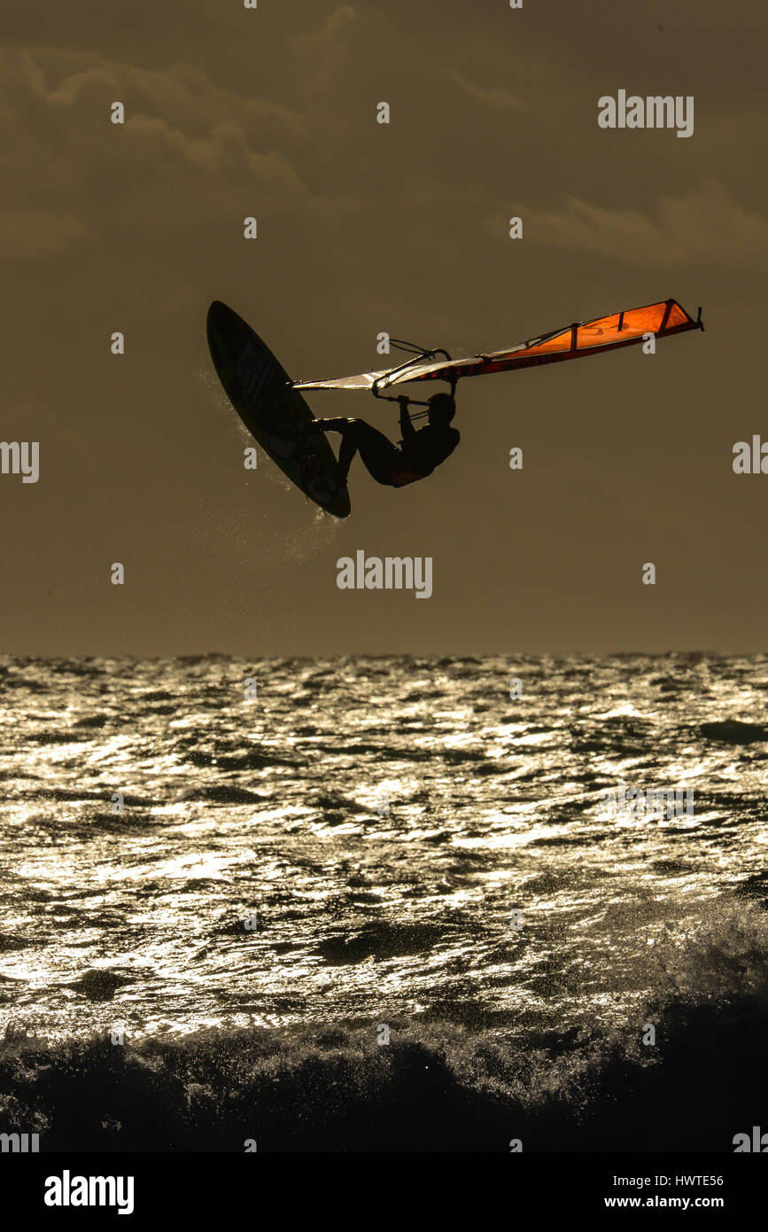 Windsurfer riding the waves hi-res stock photography and images - Alamy