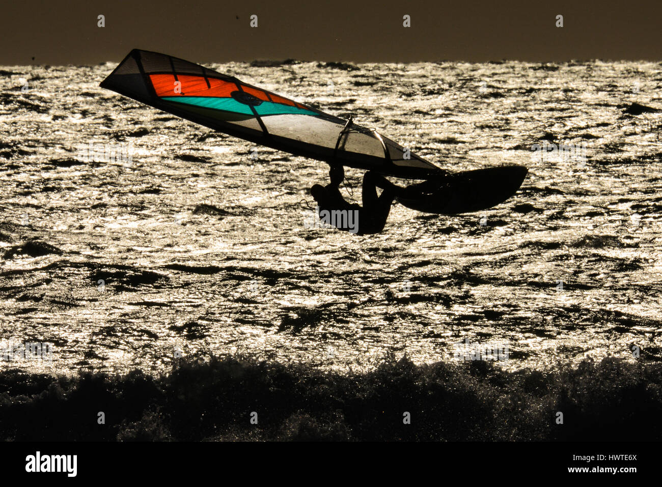 Windsurfer riding waves in hi-res stock photography and images - Alamy