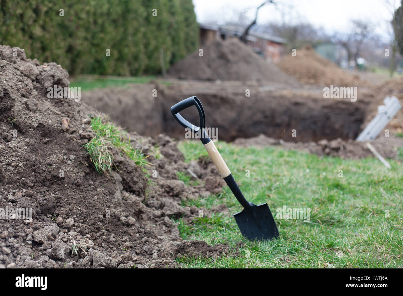 Spades in the ground hi-res stock photography and images - Alamy