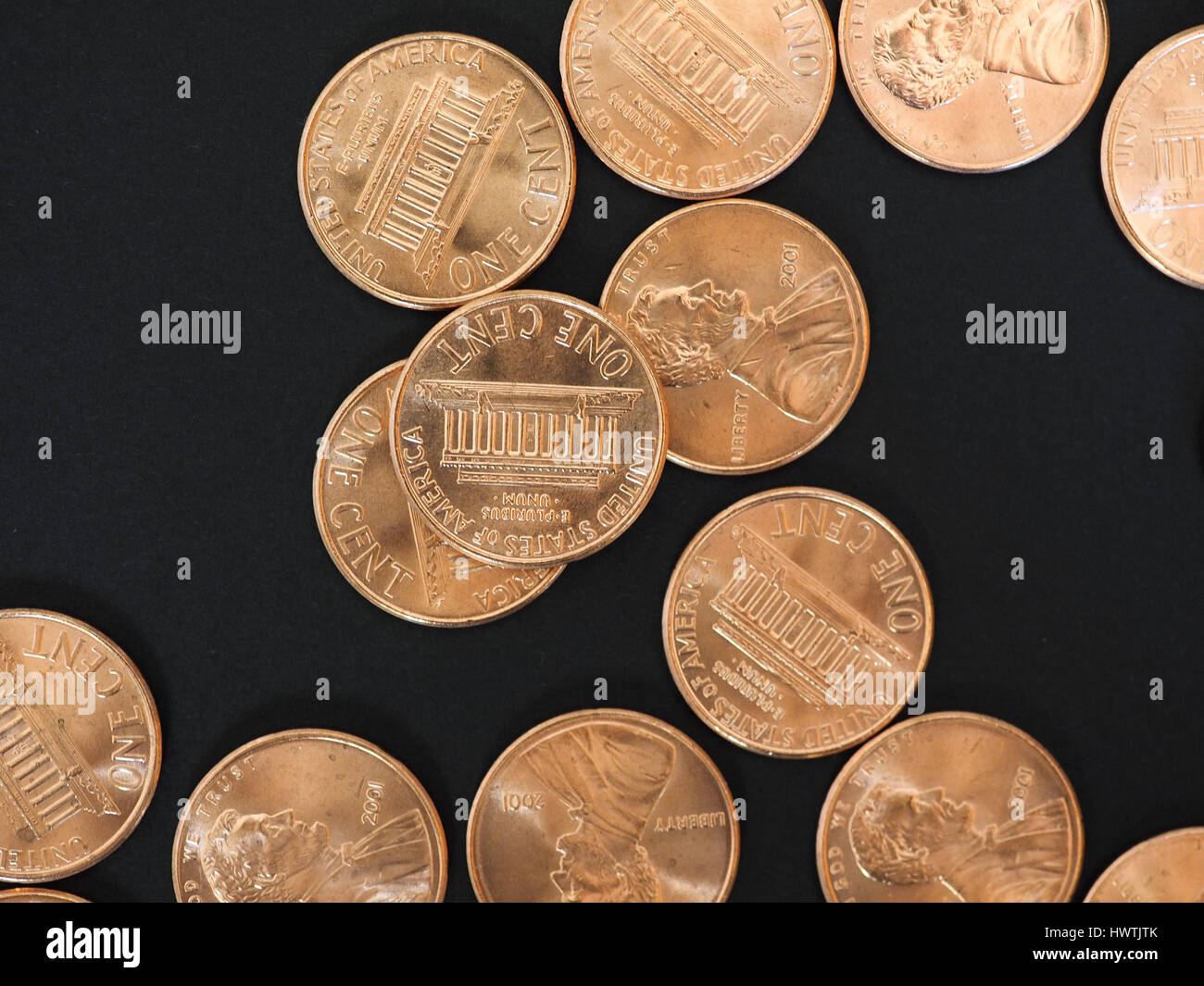 One Cent Dollar coins money (USD), currency of United States over black ...