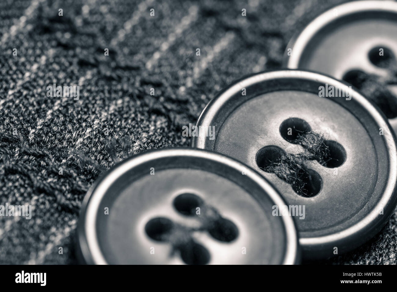 particular of three black buttons Stock Photo - Alamy