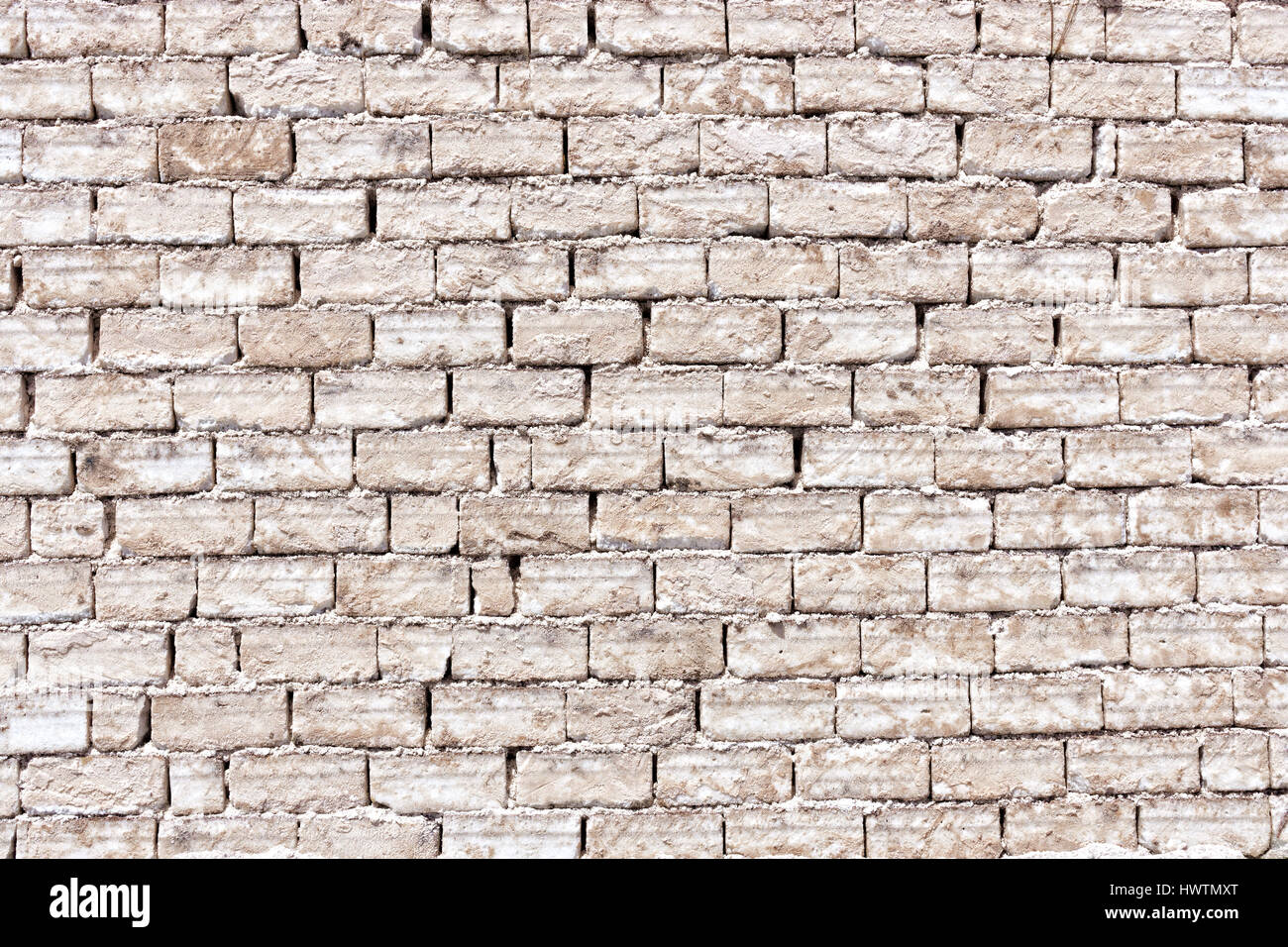 Salt brick wall background. The bricks are formed out of the salt of ...