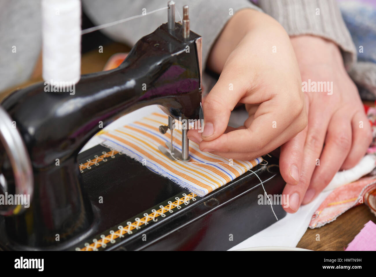 mother teaching child boy sew, job training, handmade and handicraft ...