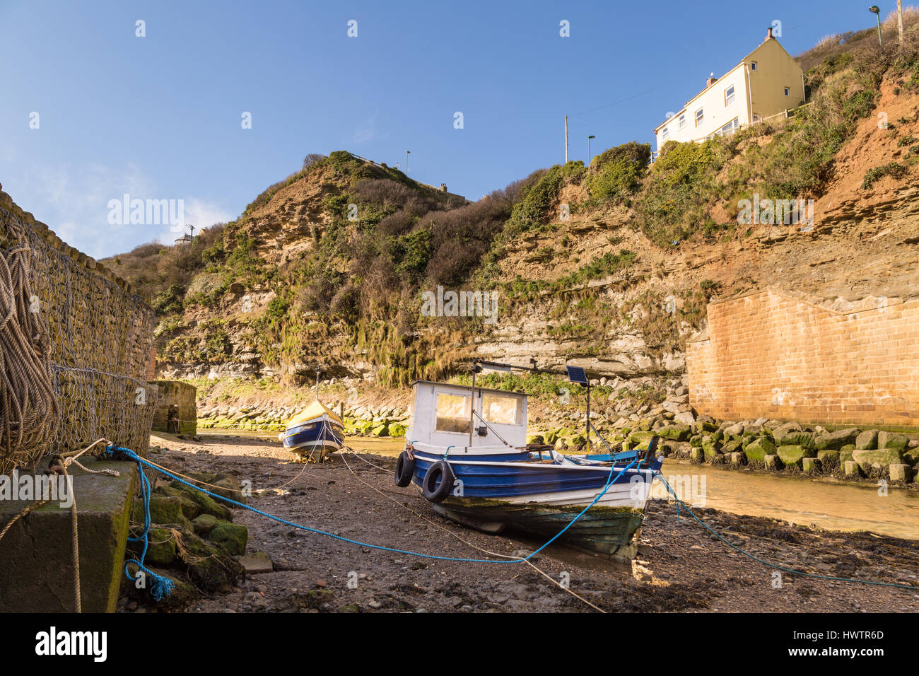 STAITHES, ENGLAND - MARCH 1: HDR image of Staithes Beck with beached ...