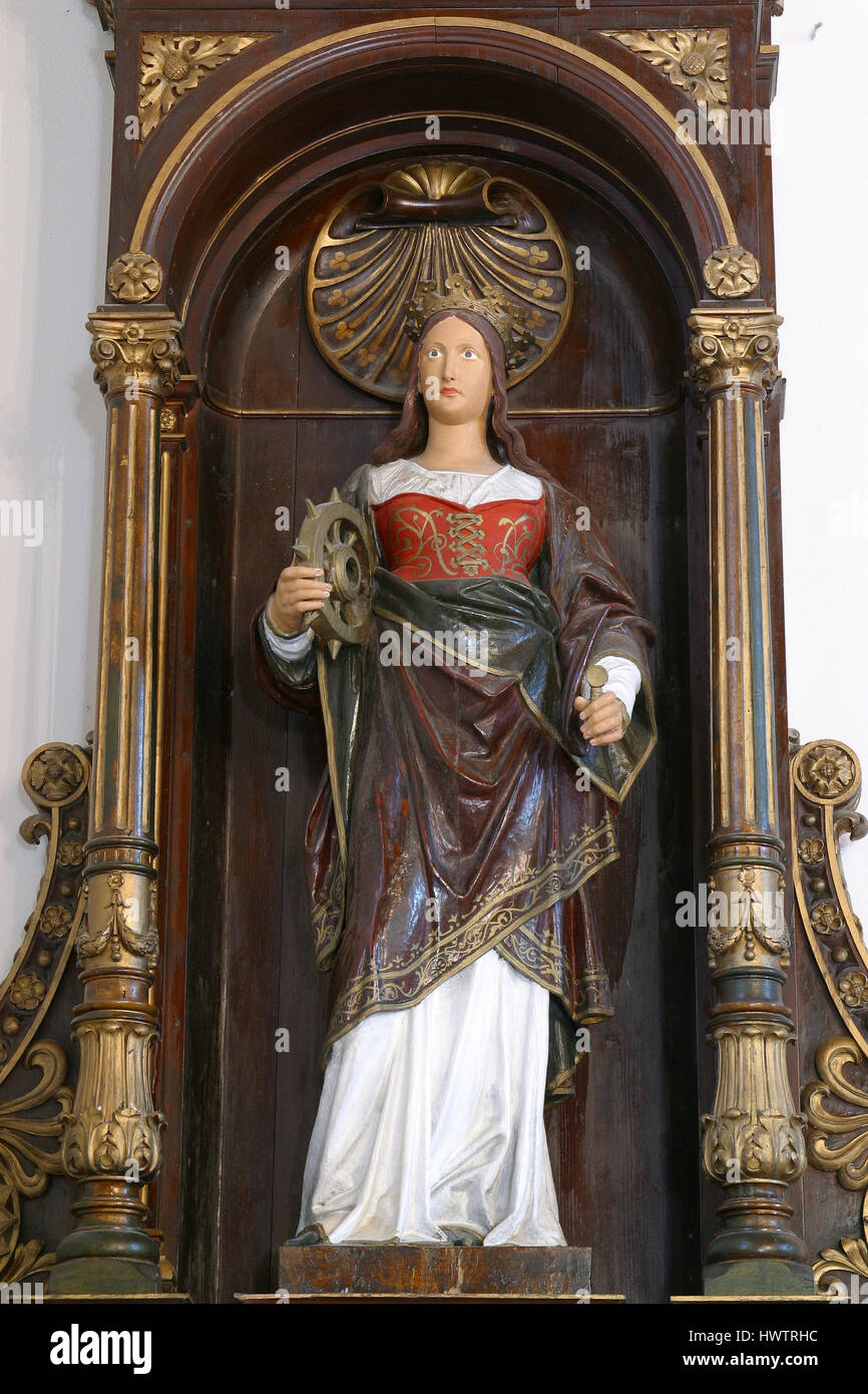 Saint Catherine of Alexandria statue on the altar in Parish Church of ...