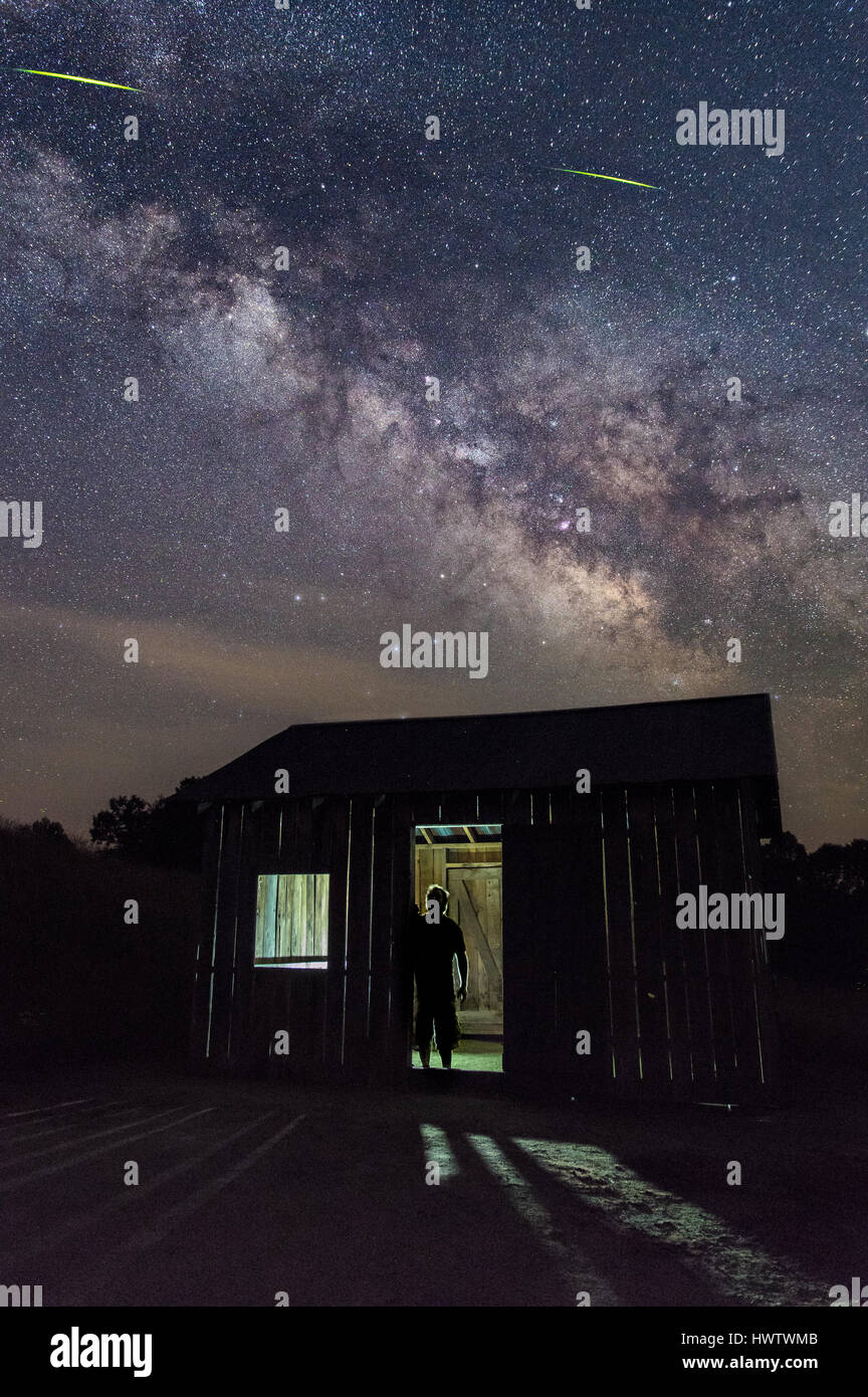 Man standing under stars at night hi-res stock photography and images ...
