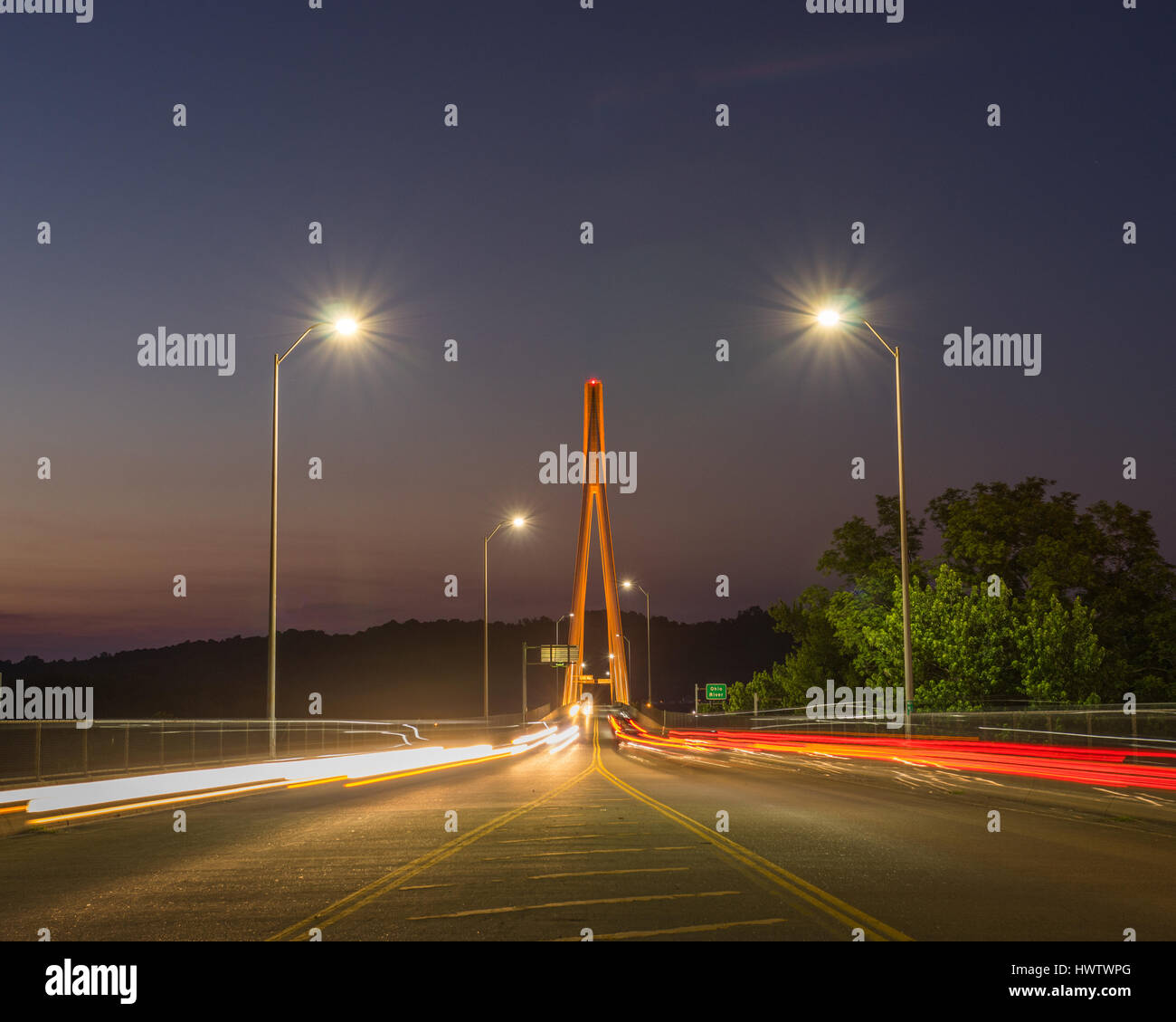 Travelers drive north and south on the East Huntington suspension ...