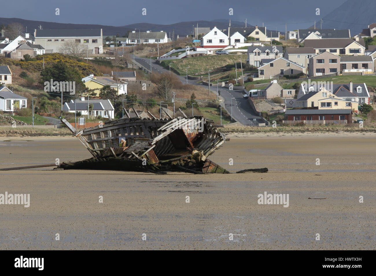 The wreck of a wooden fishing boat at Bunbeg, County Donegal, Ireland ...