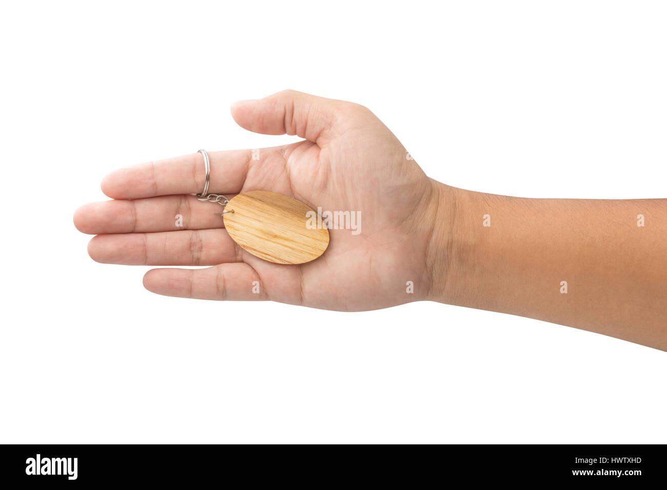 hand holding wooden Keychain isolated on white background with clipping ...