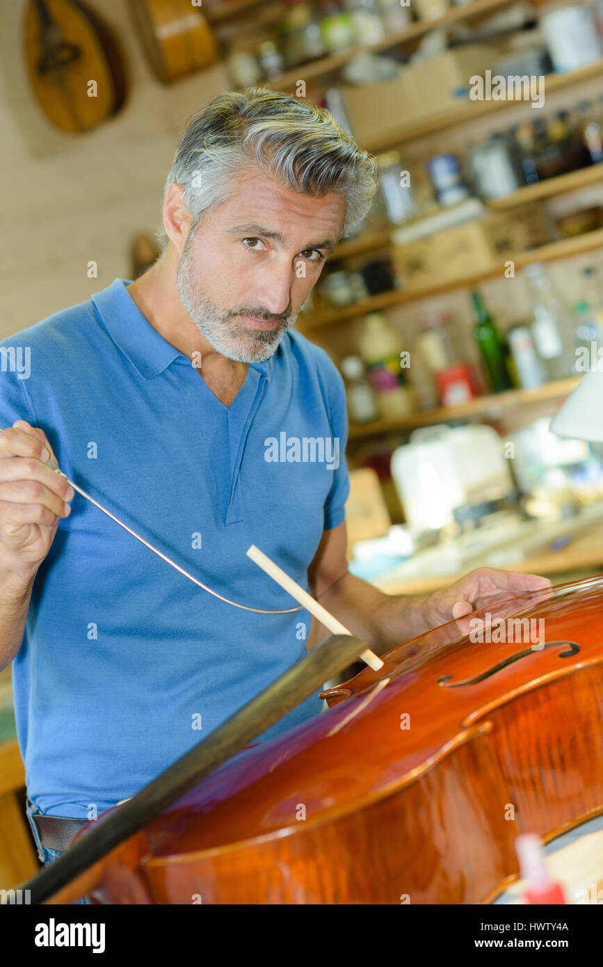 Cello repair hi-res stock photography and images - Alamy