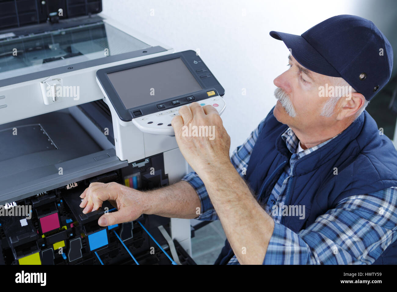 Man Repairing Photocopier High Resolution Stock Photography and Images ...