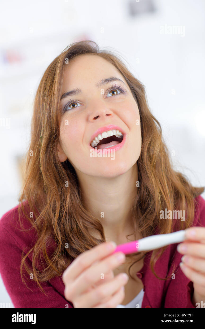 Excited at being pregnant Stock Photo - Alamy