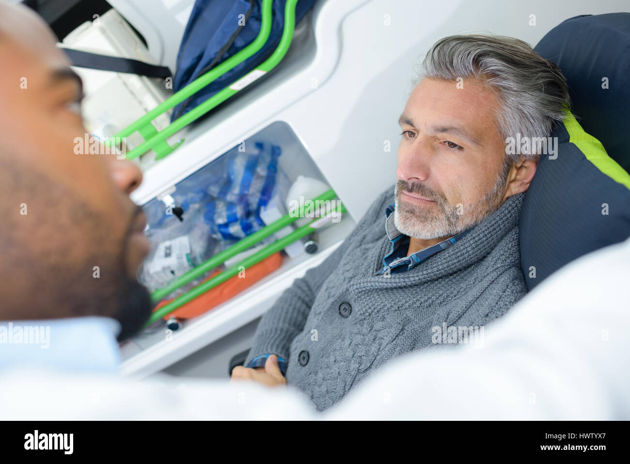 Man on stretcher hi-res stock photography and images - Alamy