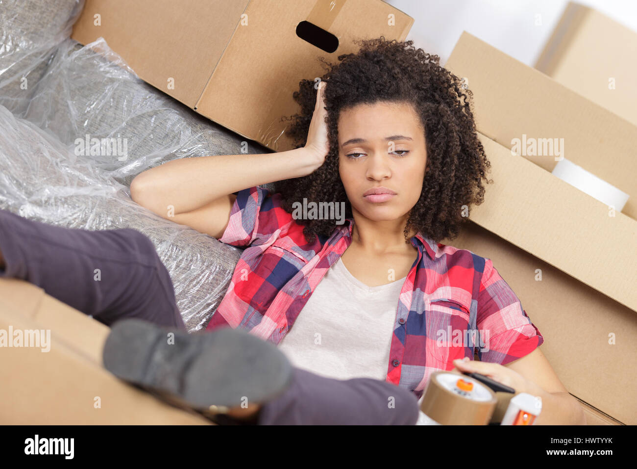 tired with packing Stock Photo - Alamy