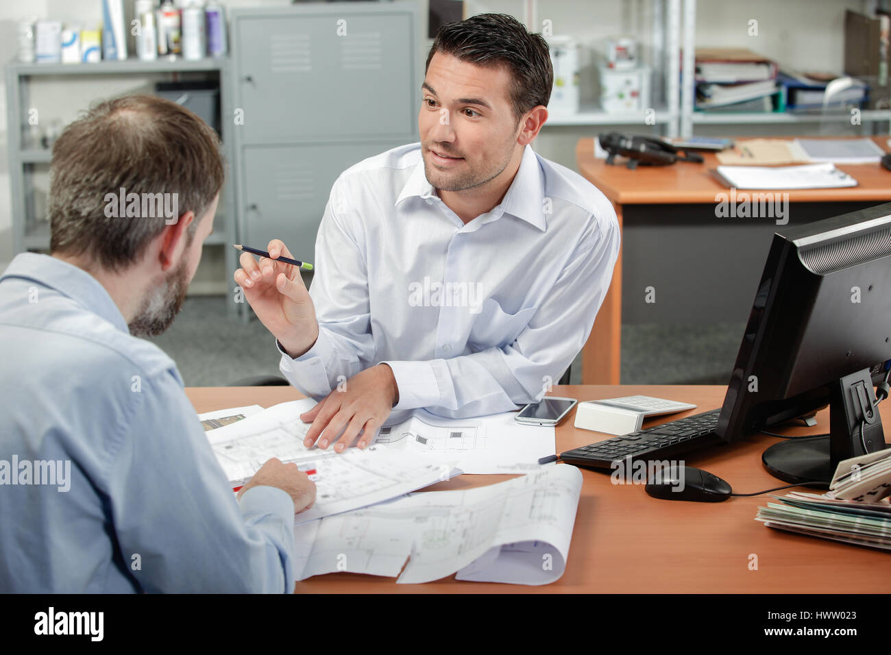 Handsome man sharing plan hi-res stock photography and images - Alamy