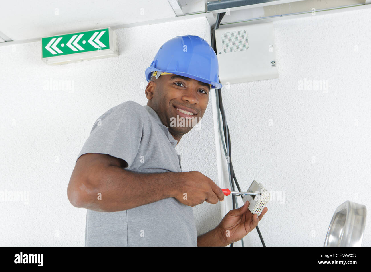 fixing the electrical wire Stock Photo - Alamy