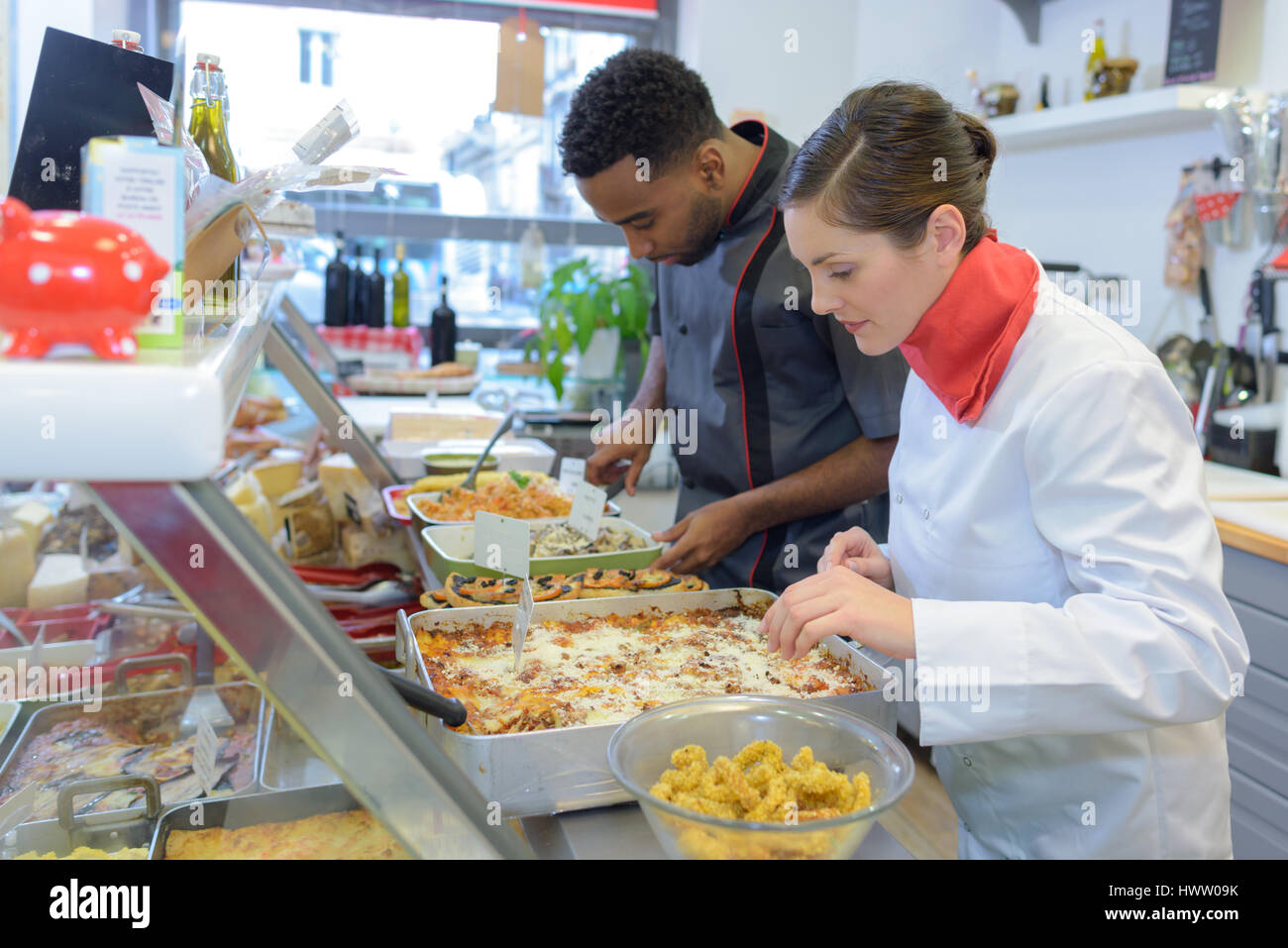 shopkeeper working in his grocery store Stock Photo - Alamy