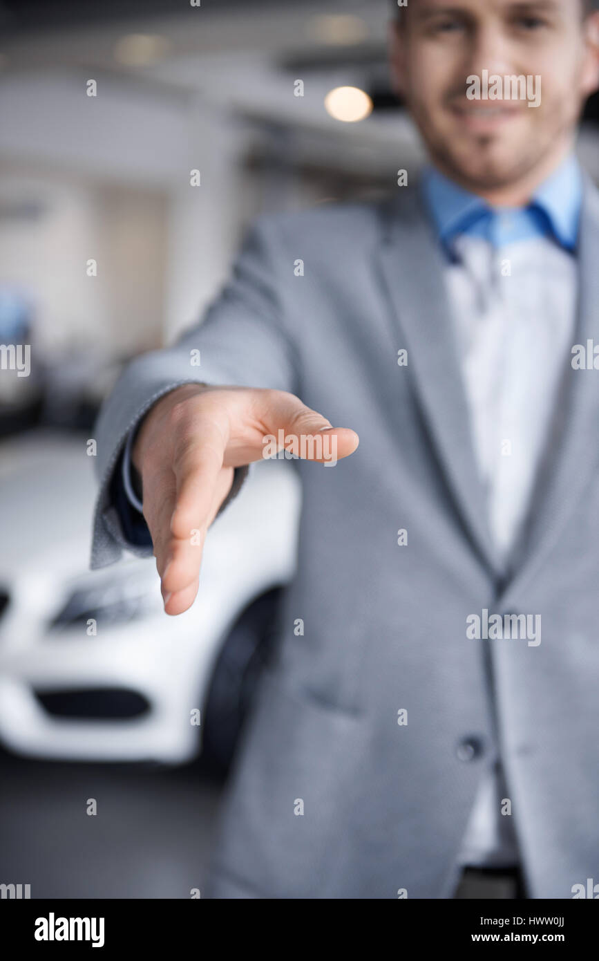 Hand reaching out suit hi-res stock photography and images - Alamy