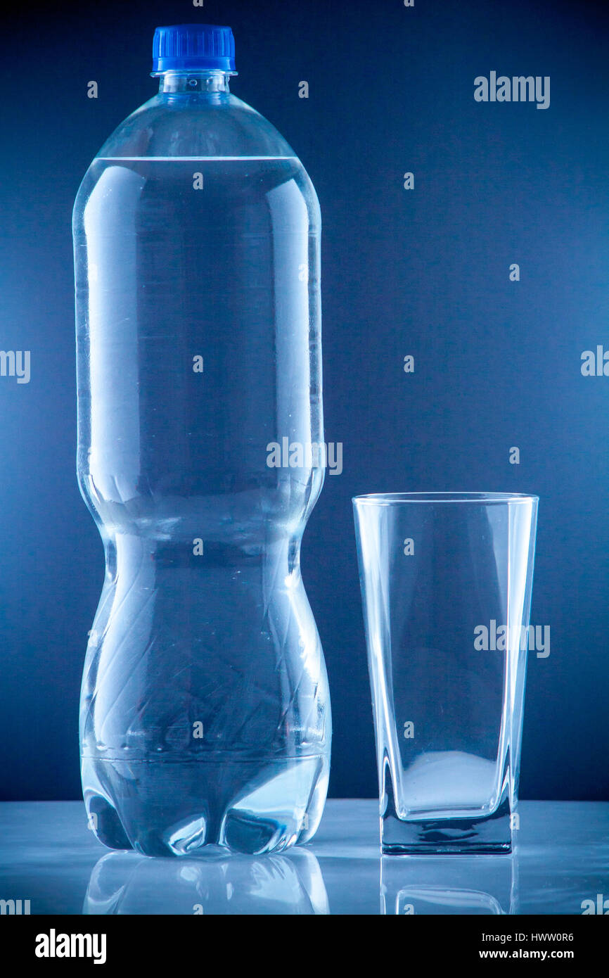 bottle of clear drinking cold mineral water with gas in isolation on ...