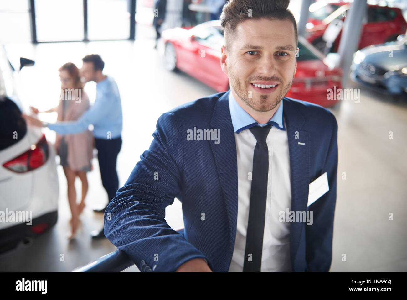 Car salesman in dealership hi-res stock photography and images - Alamy