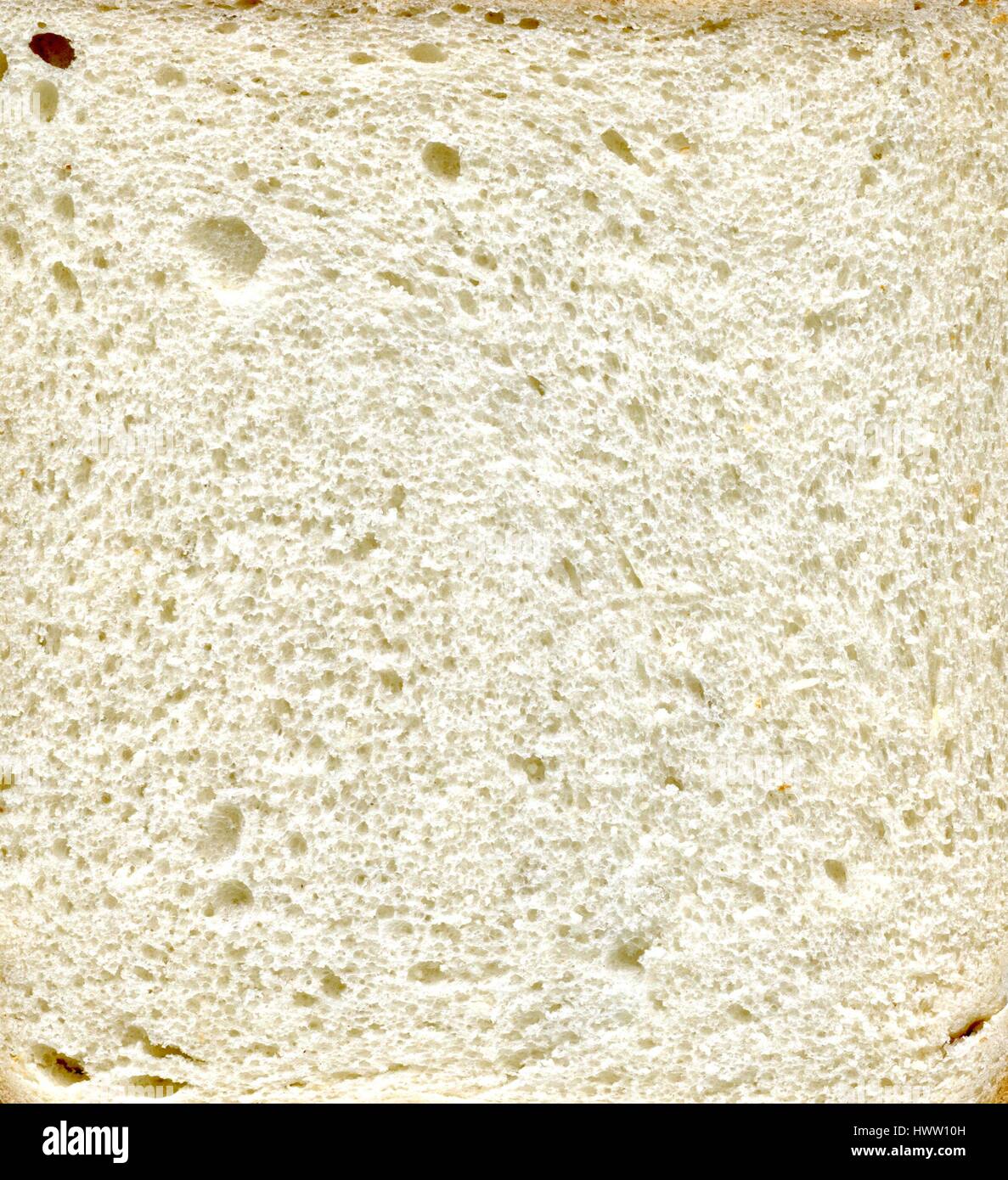Texture background of a slice of white bread Stock Photo - Alamy