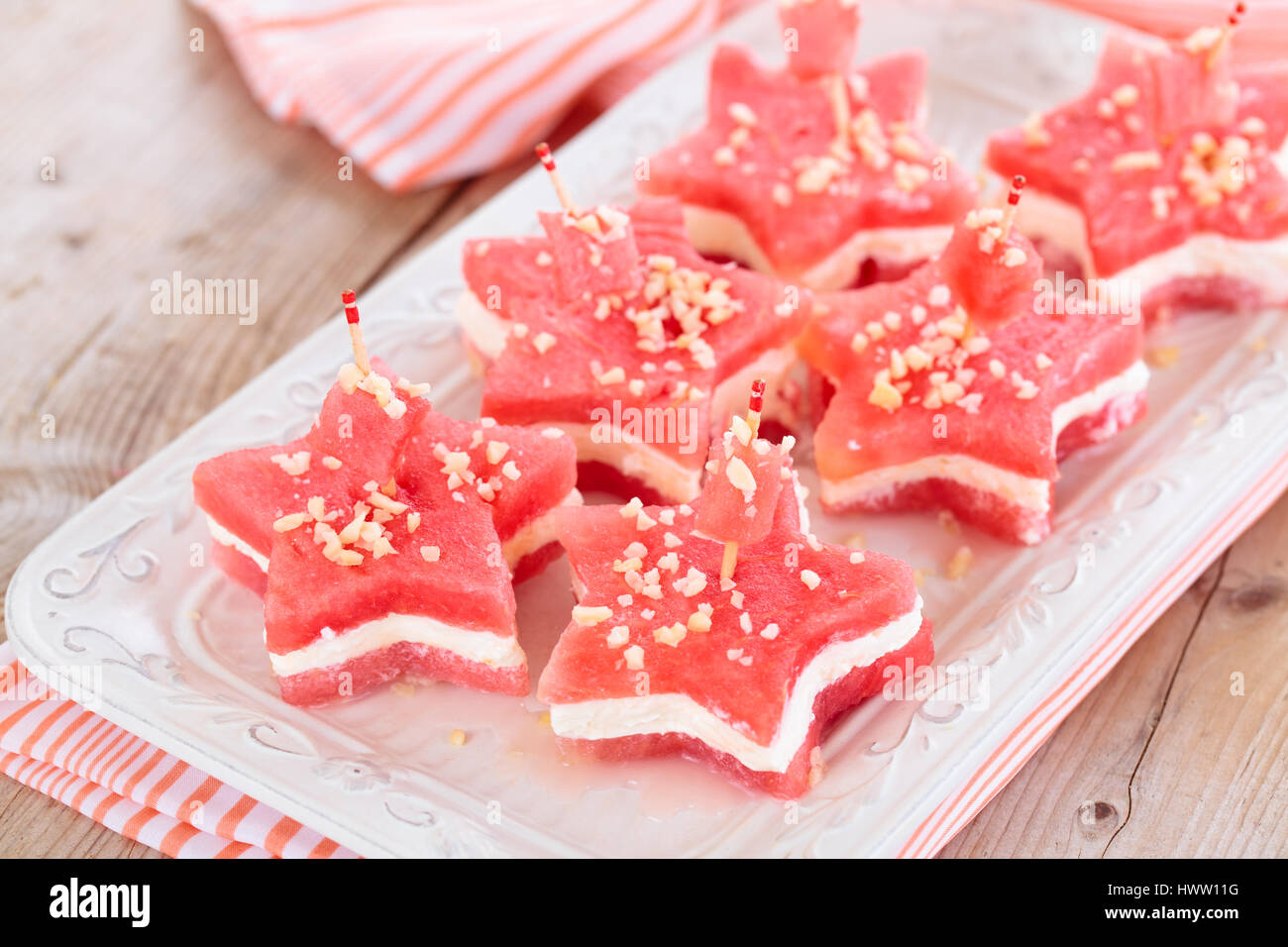 Star shaped watermelon sandwiches with soft cheese and nuts Stock Photo ...