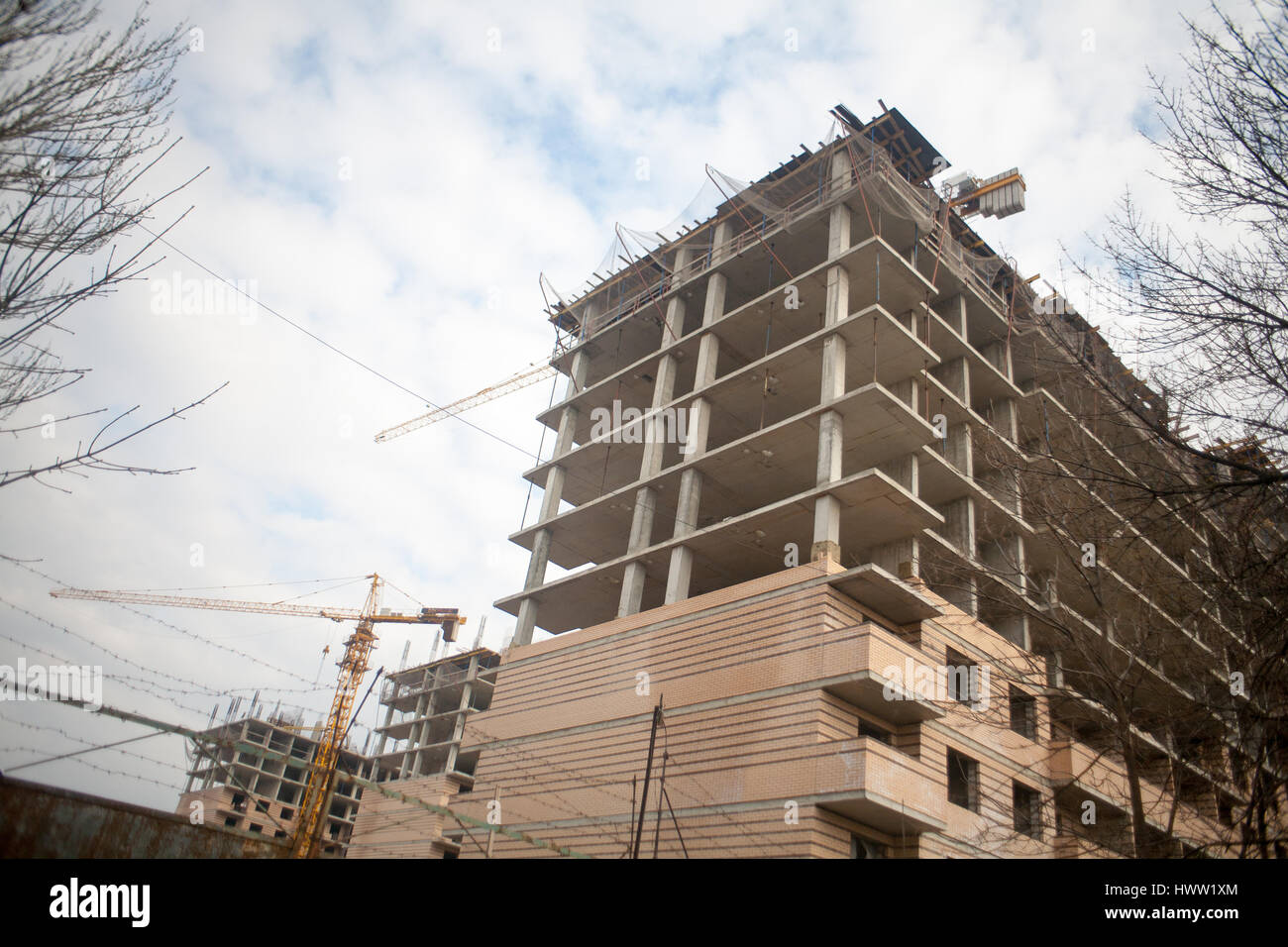 The construction of multi-storey housing building Stock Photo - Alamy