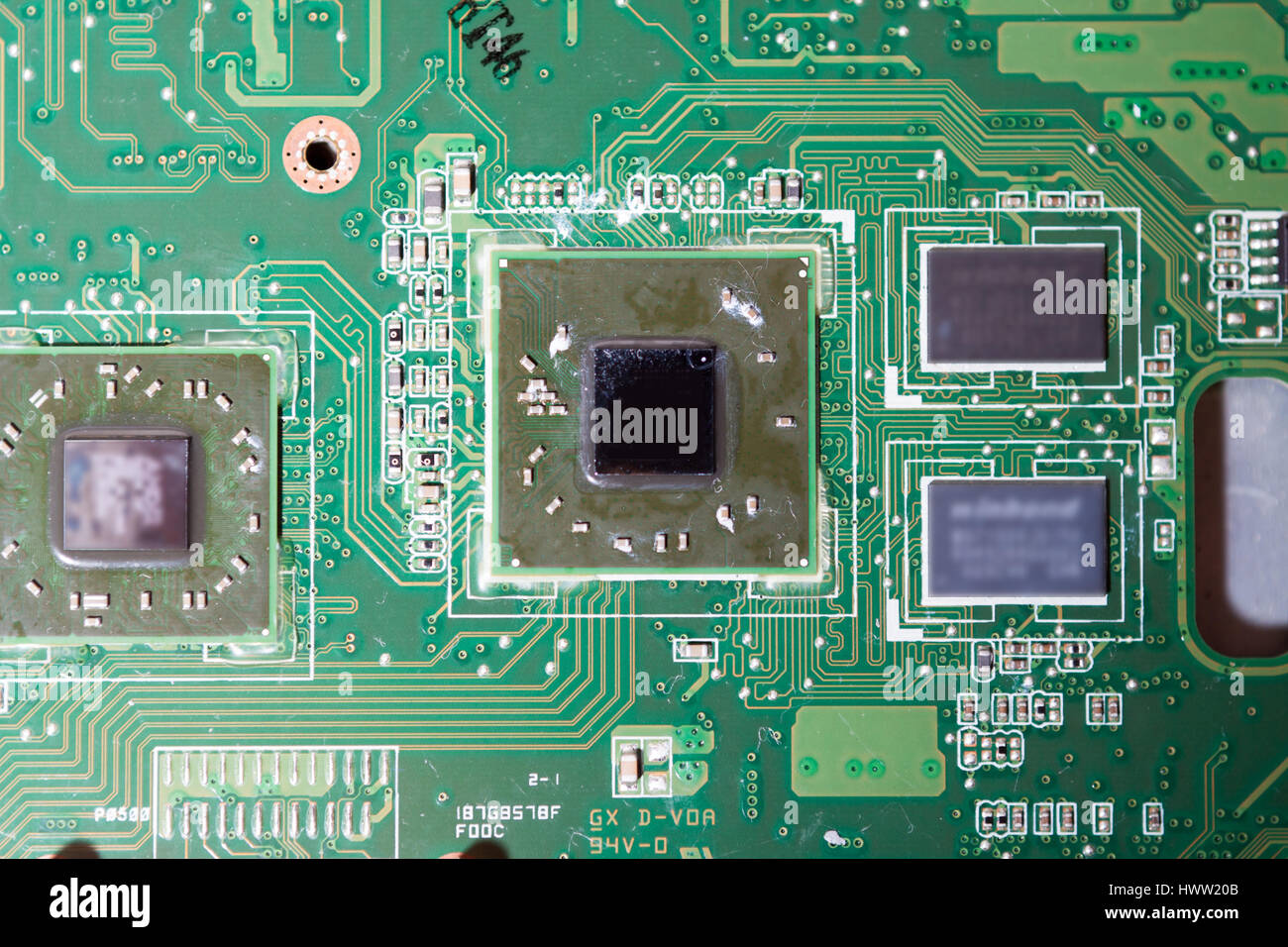 Close-up of electronic circuit board with chips and processors ...