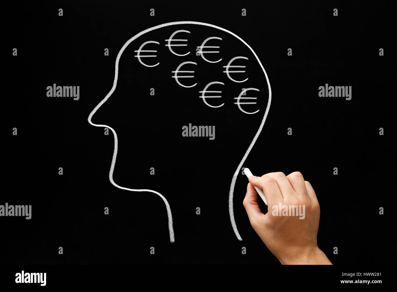 Hand drawing human head and many euro signs with white chalk on ...
