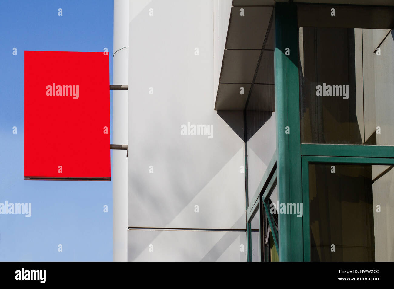 horizontal side view of empty red square signage on the exterior of a ...