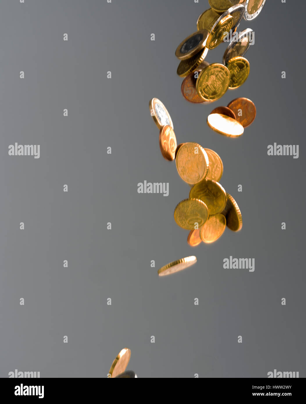 Falling Euro coins Stock Photo - Alamy