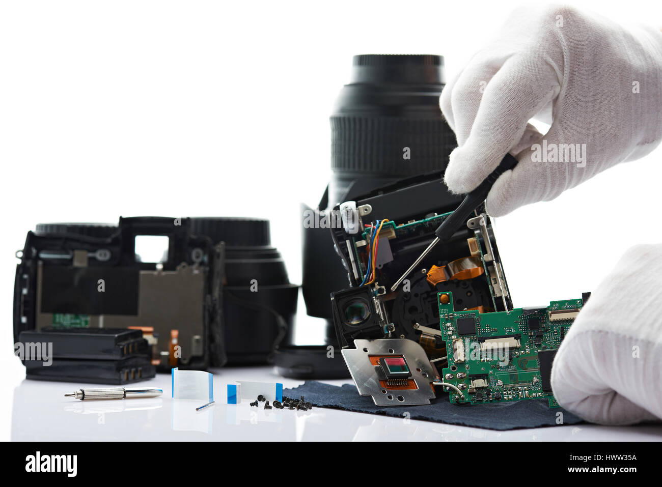 Disassemble modern photo digital camera isolated on white background ...