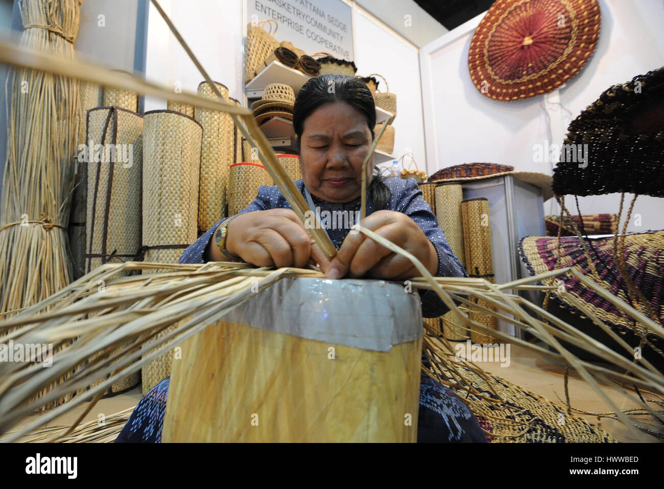 Bangkok, Thailand. 23rd Mar, 2017. A craftswoman demonstrates the ...