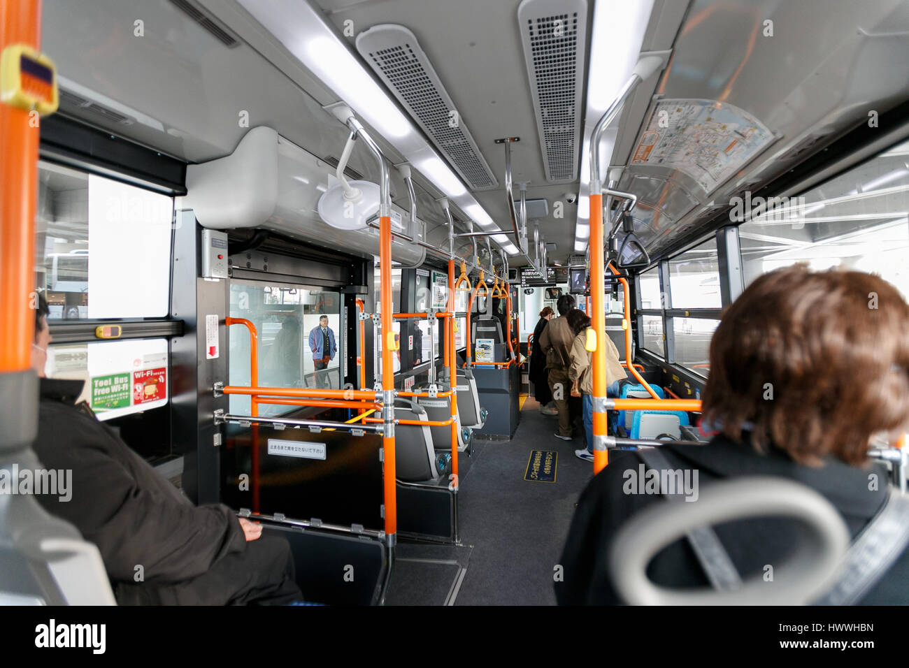 Passengers inside a hydrogen fuel cell bus on March 23, 2017, Tokyo ...