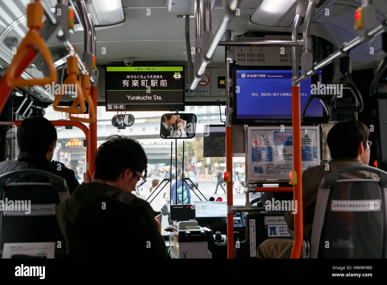 Passengers inside a hydrogen fuel cell bus on March 23, 2017, Tokyo ...