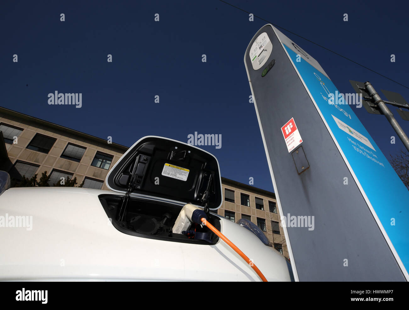 Essen, Germany. 17th Mar, 2017. An electric car charges at a power ...