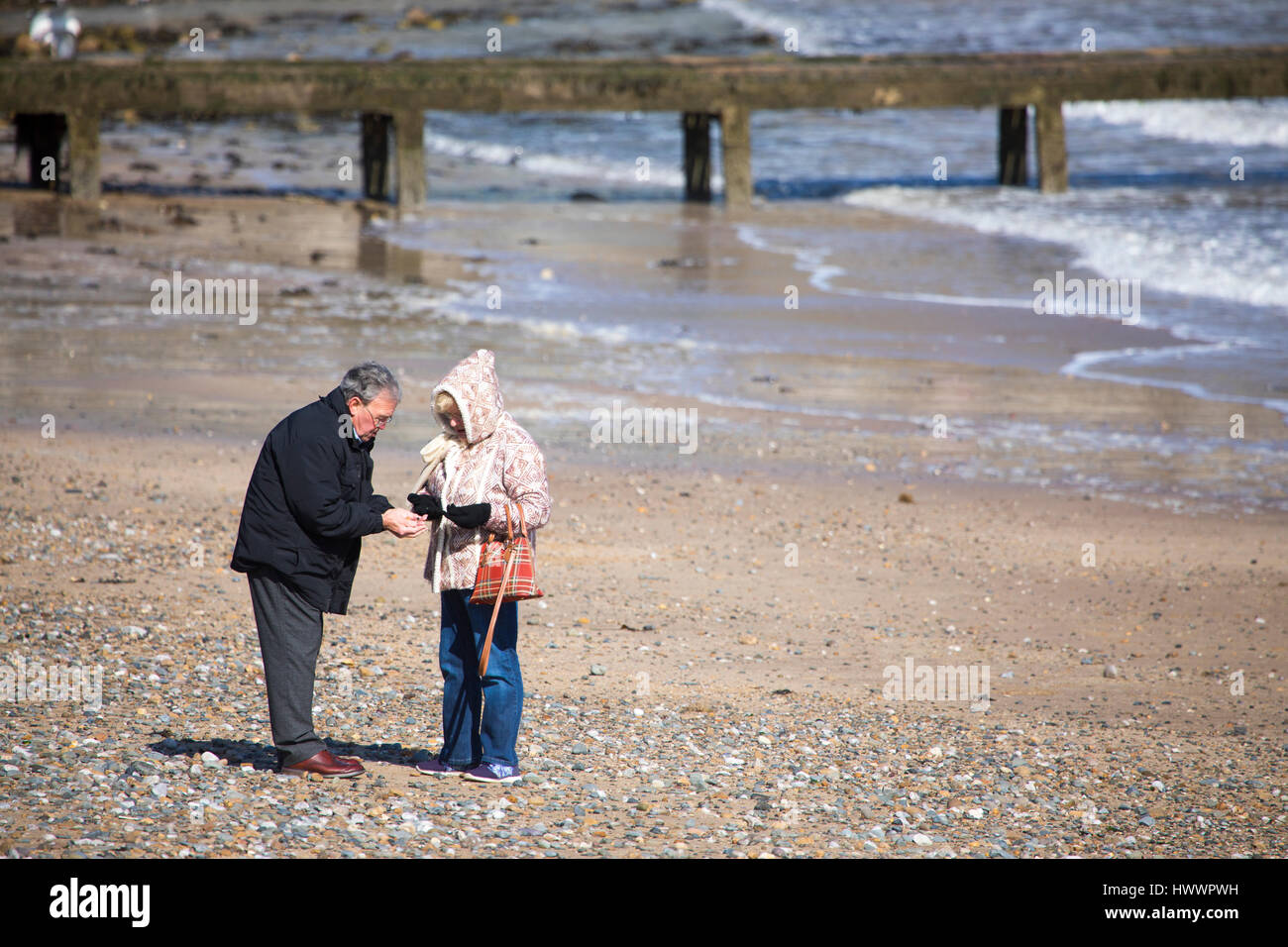 Searching for shells hi-res stock photography and images - Alamy