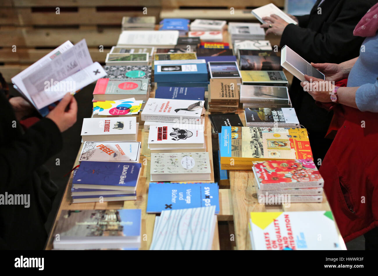 Visitors look at the stand of Swips (Swiss Independent Publishers) at ...