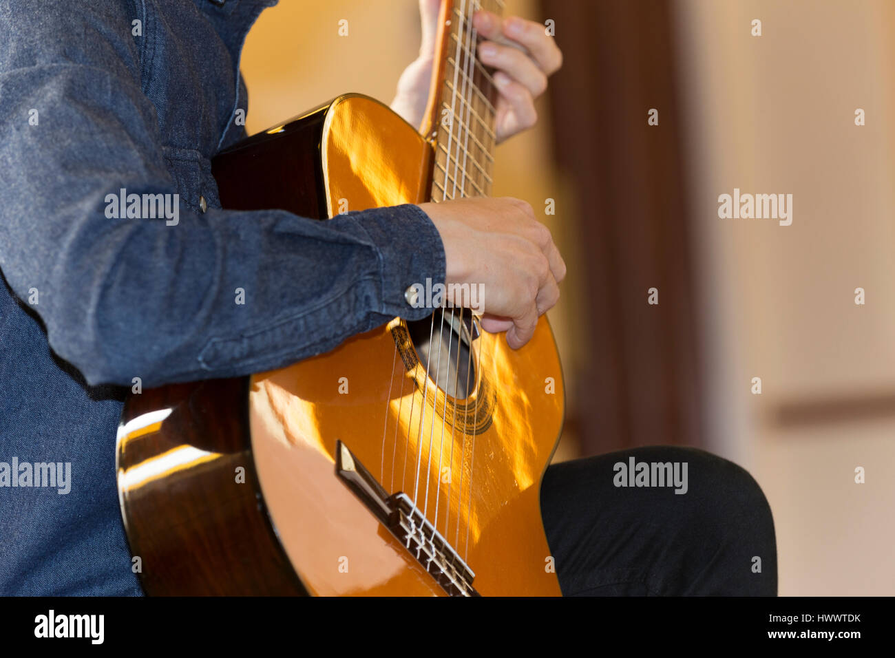 Guitar played hi-res stock photography and images - Alamy